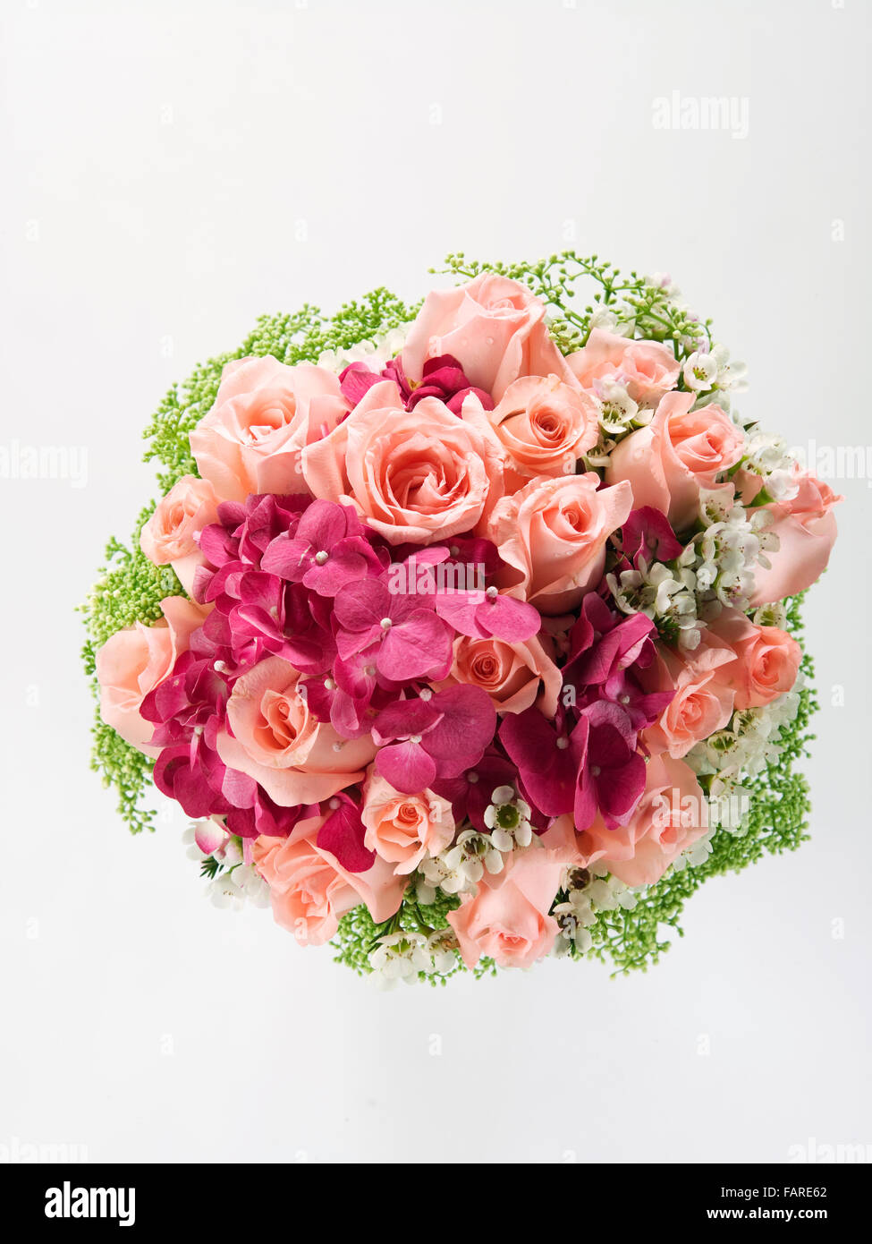 Bouquet of pink roses on plain background Stock Photo - Alamy