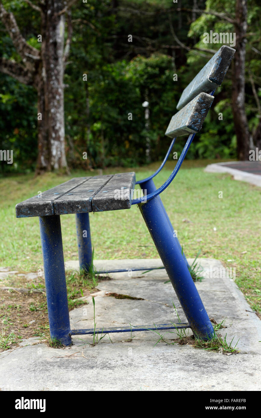 Side view of a bench in a park Stock Photo - Alamy