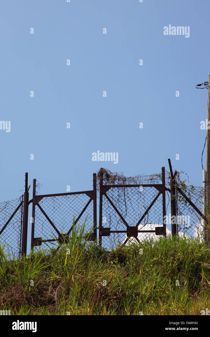 Factory gate that is locked Stock Photo - Alamy