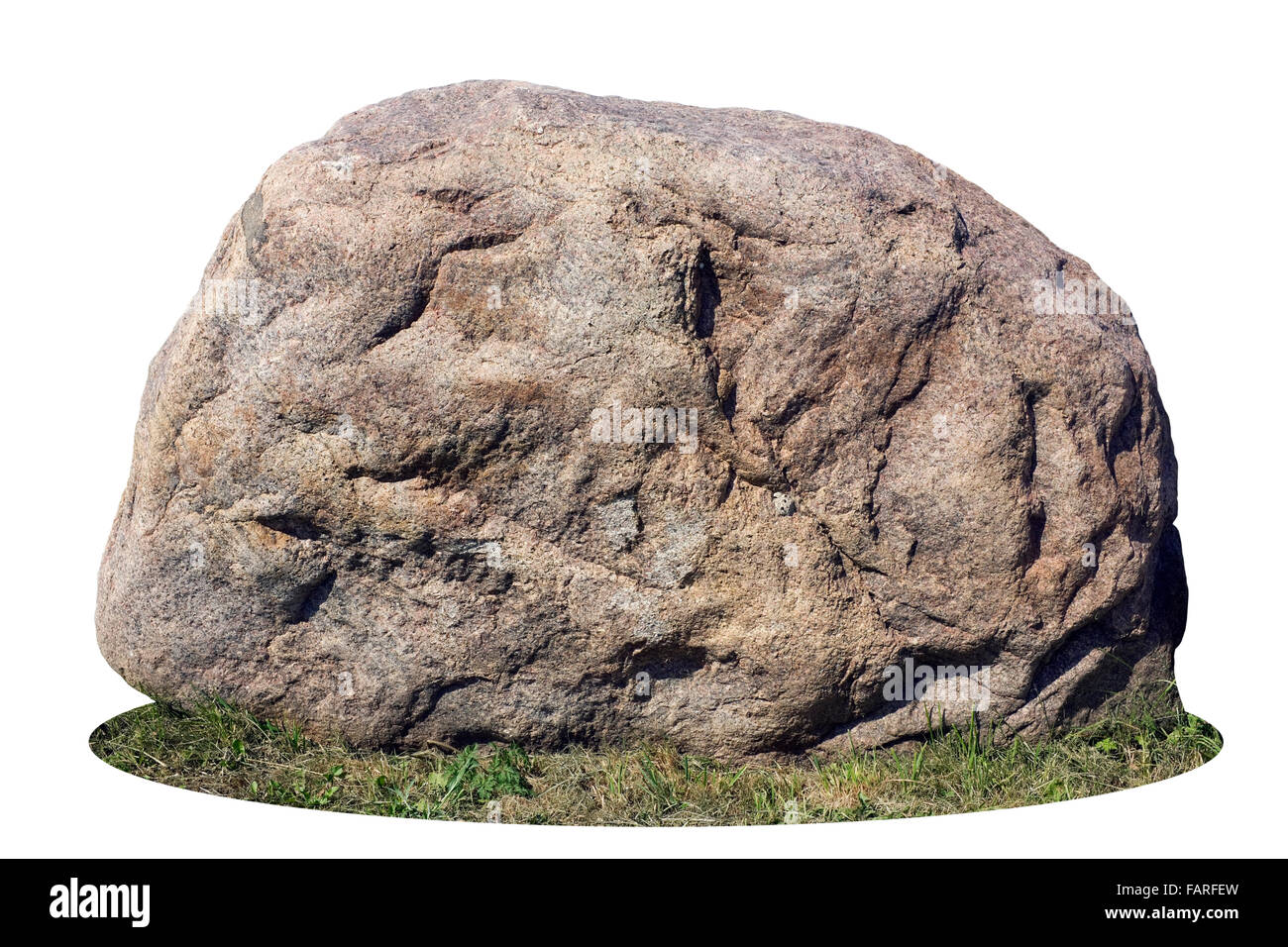 Big granite stone on green grass lawn isolated Stock Photo - Alamy