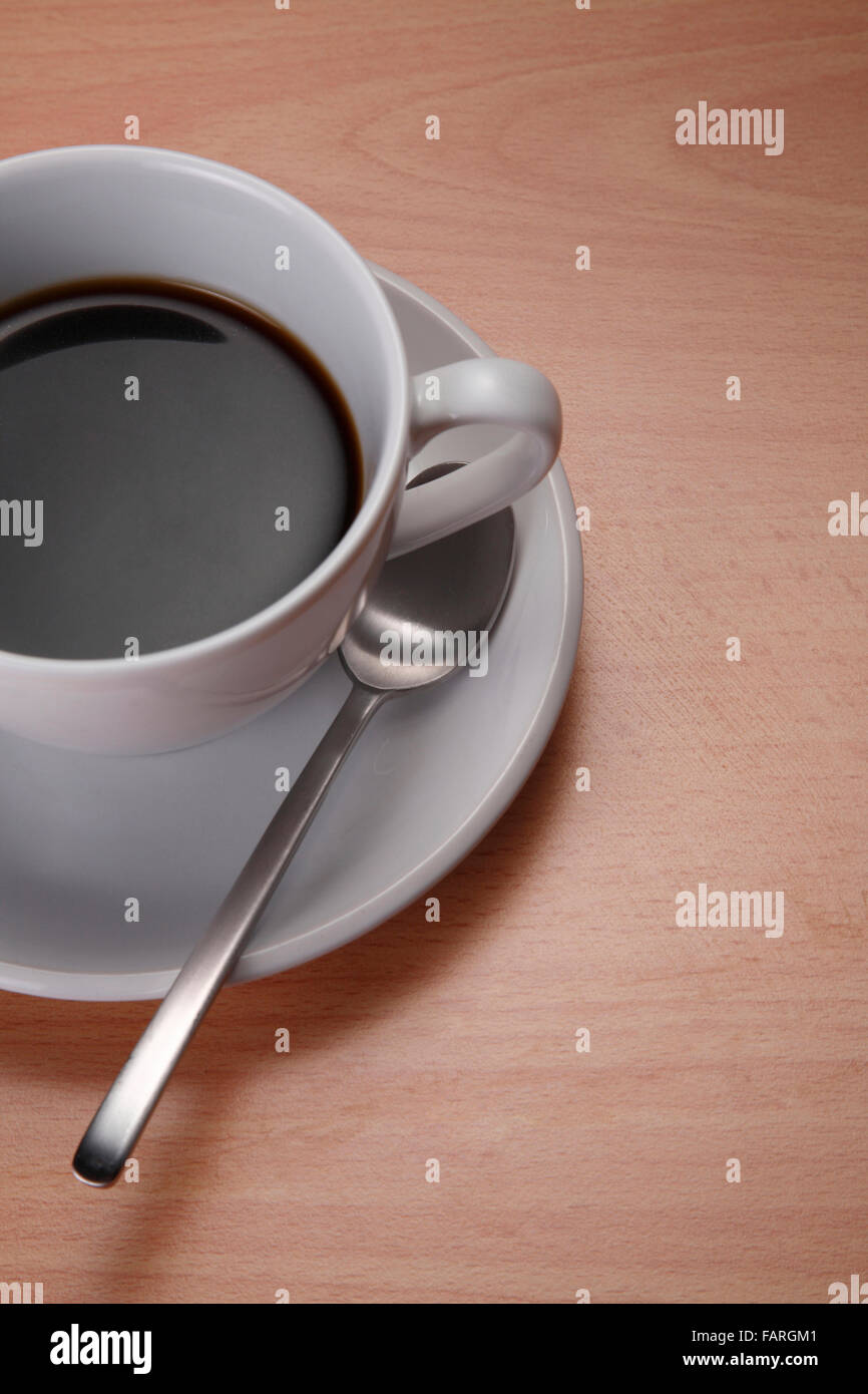 Coffee cup isolated (seen from above) on a table top Stock Photo - Alamy