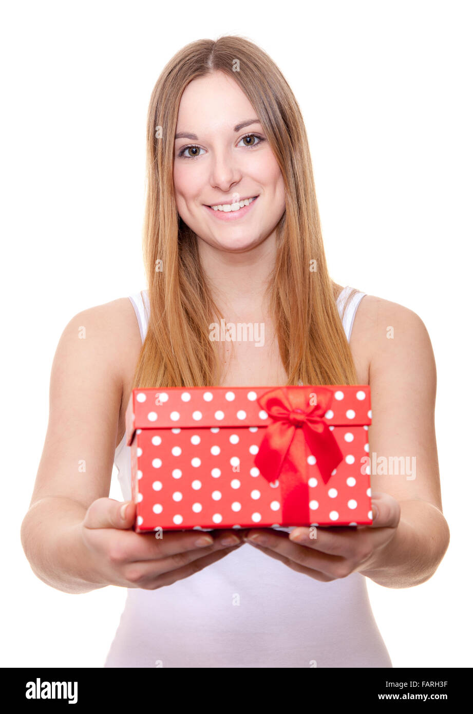 Attractive young woman holding present. All on white background Stock ...