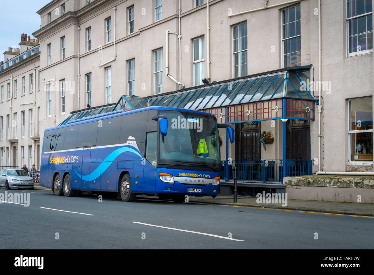 A popular low cost Shearings Holidays coach outside the Royal Hotel ...