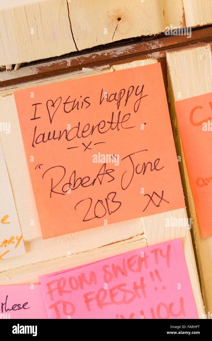 Post it notes with feedback and comments from customers at a laundromat ...