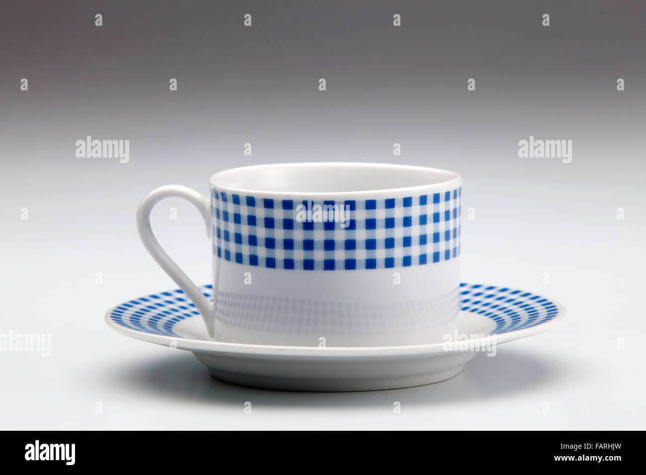 stock image of the cup with checker printed Stock Photo - Alamy