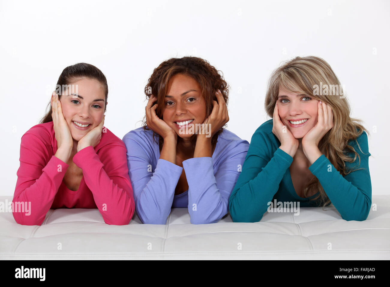 Three female friends Stock Photo - Alamy