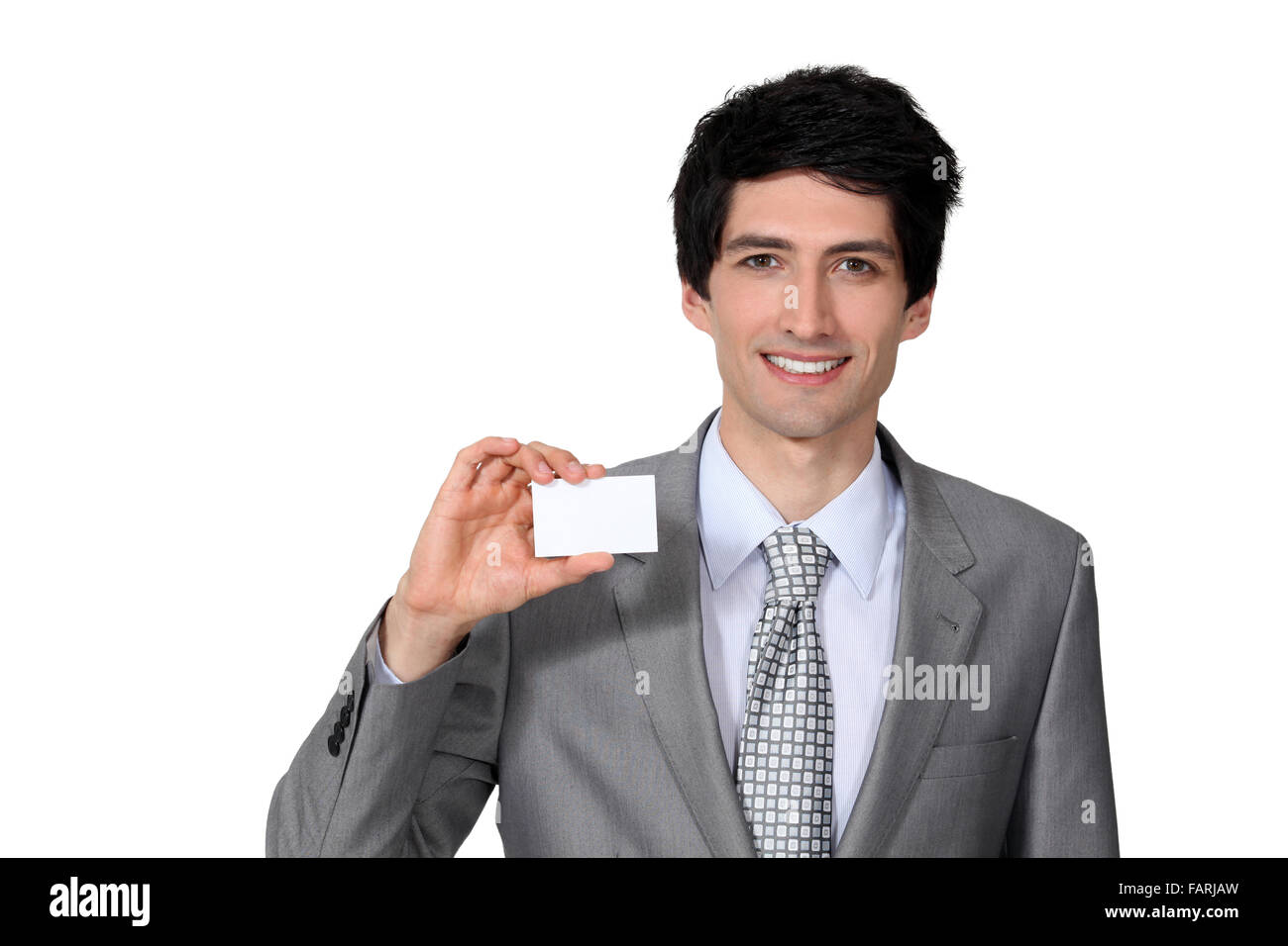 Man brandishing business card Stock Photo - Alamy