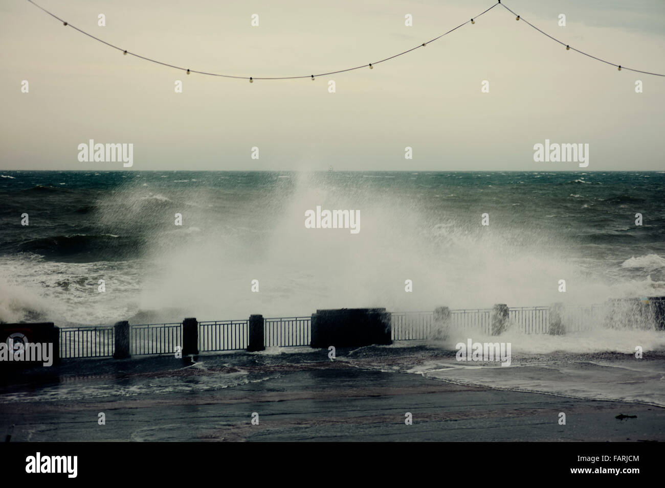 Storm water over seafront Stock Photo - Alamy
