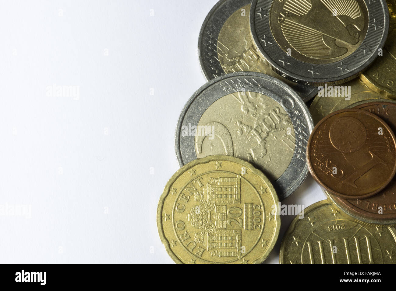 used euro coins with scratches on white background Stock Photo - Alamy