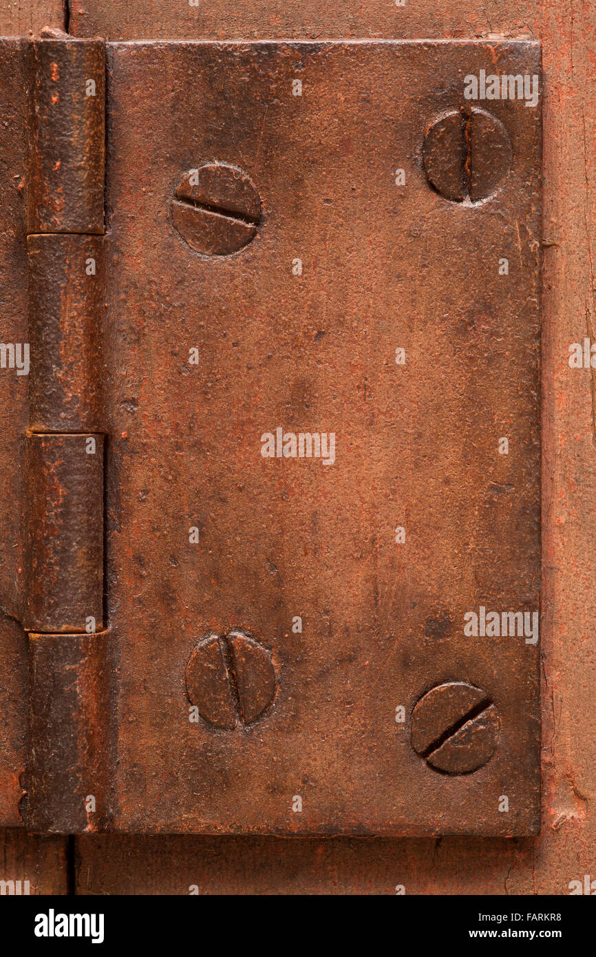 old rusted hinge with screws or vintage background Stock Photo - Alamy