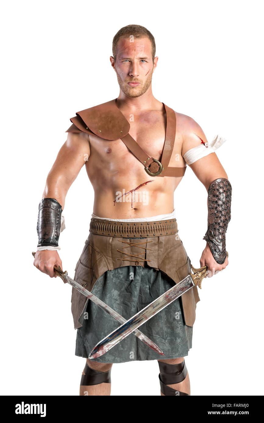 Gladiator posing isolated in a white background Stock Photo - Alamy