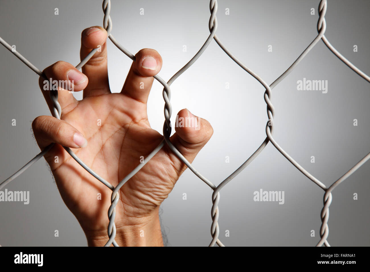Black hand fence hi-res stock photography and images - Alamy