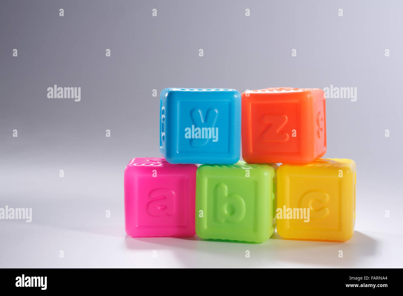 Child playing abc blocks hi-res stock photography and images - Alamy