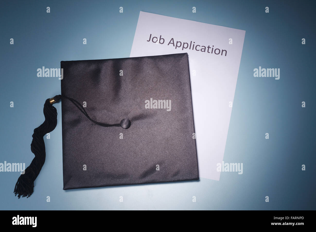 Application form with graduation hat Stock Photo - Alamy