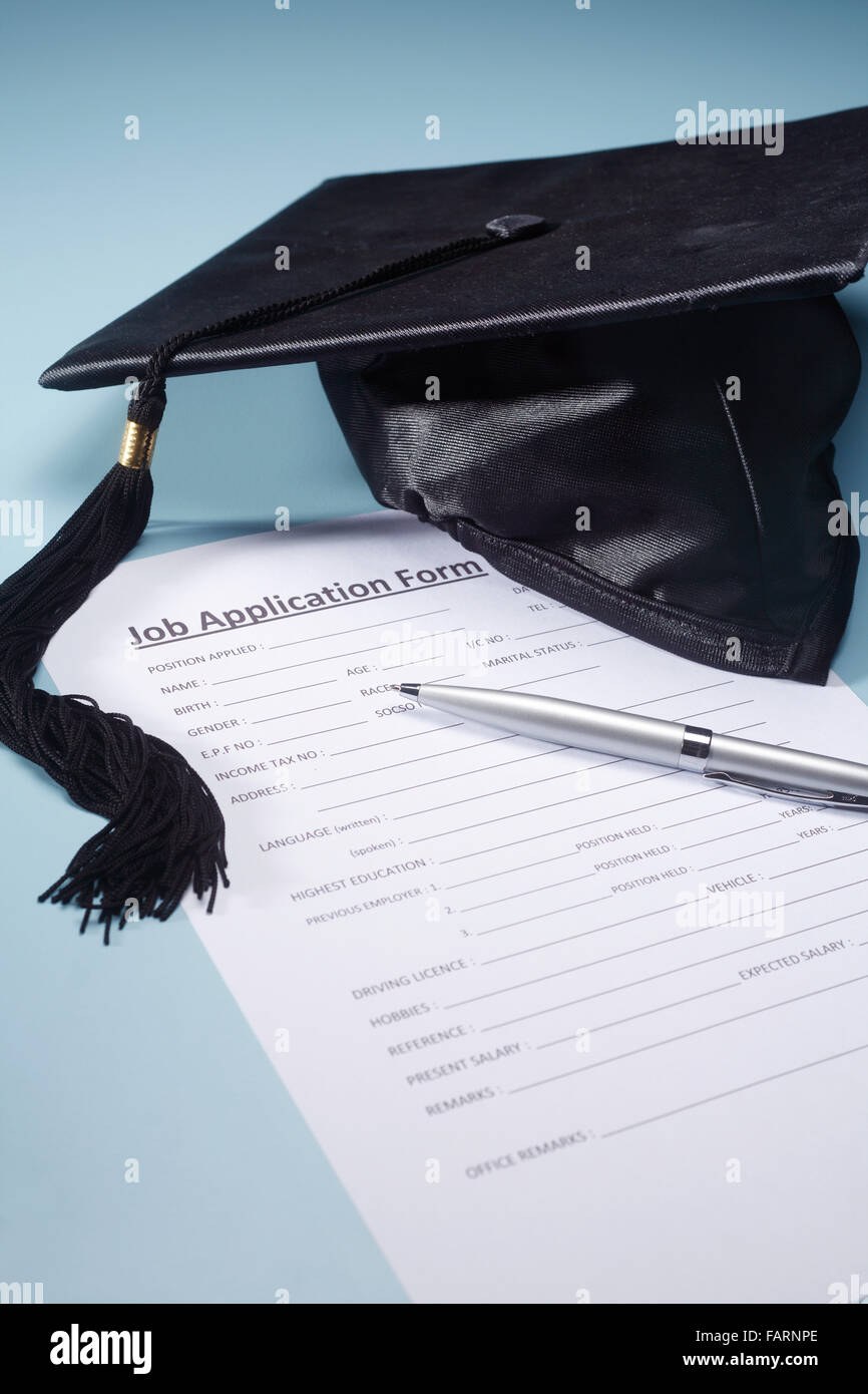 Graduation hat with application form Stock Photo - Alamy