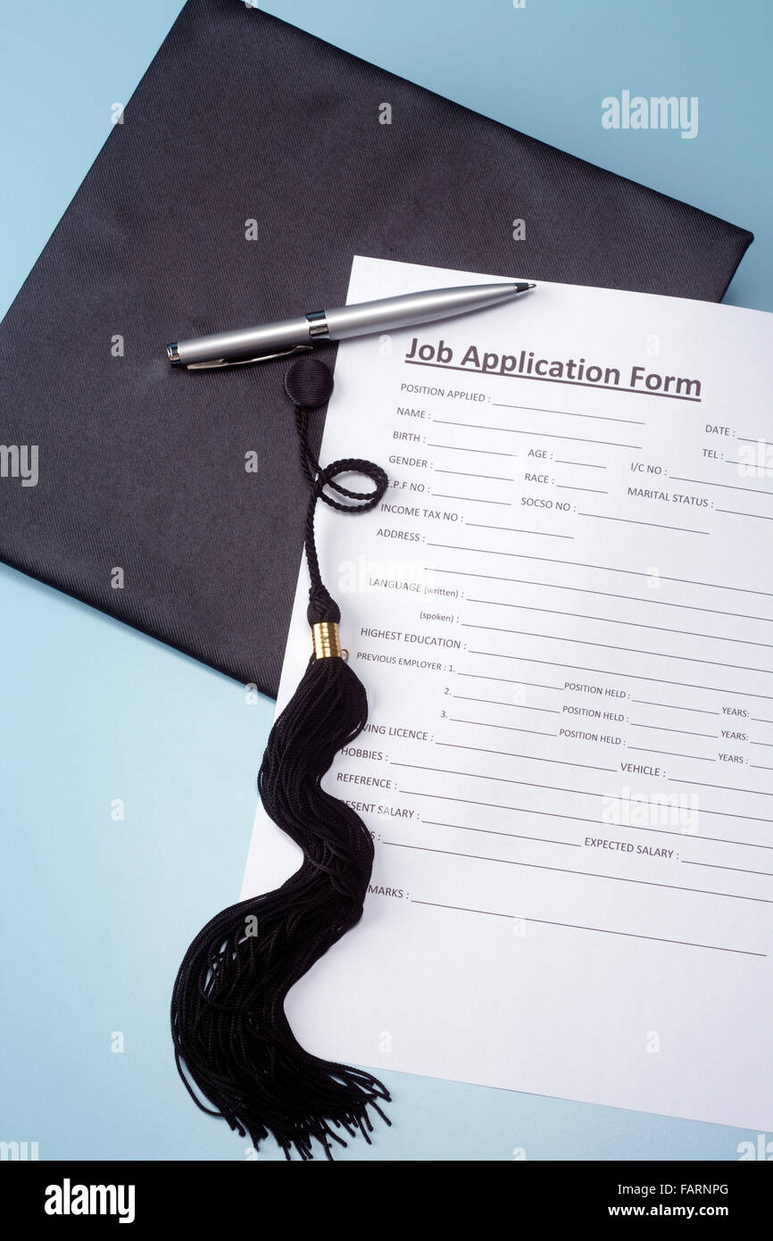 Graduation hat with application form Stock Photo - Alamy
