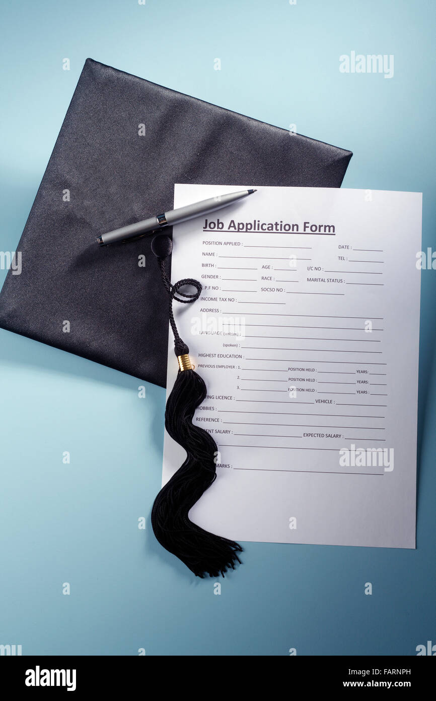 Graduation hat with application form Stock Photo - Alamy