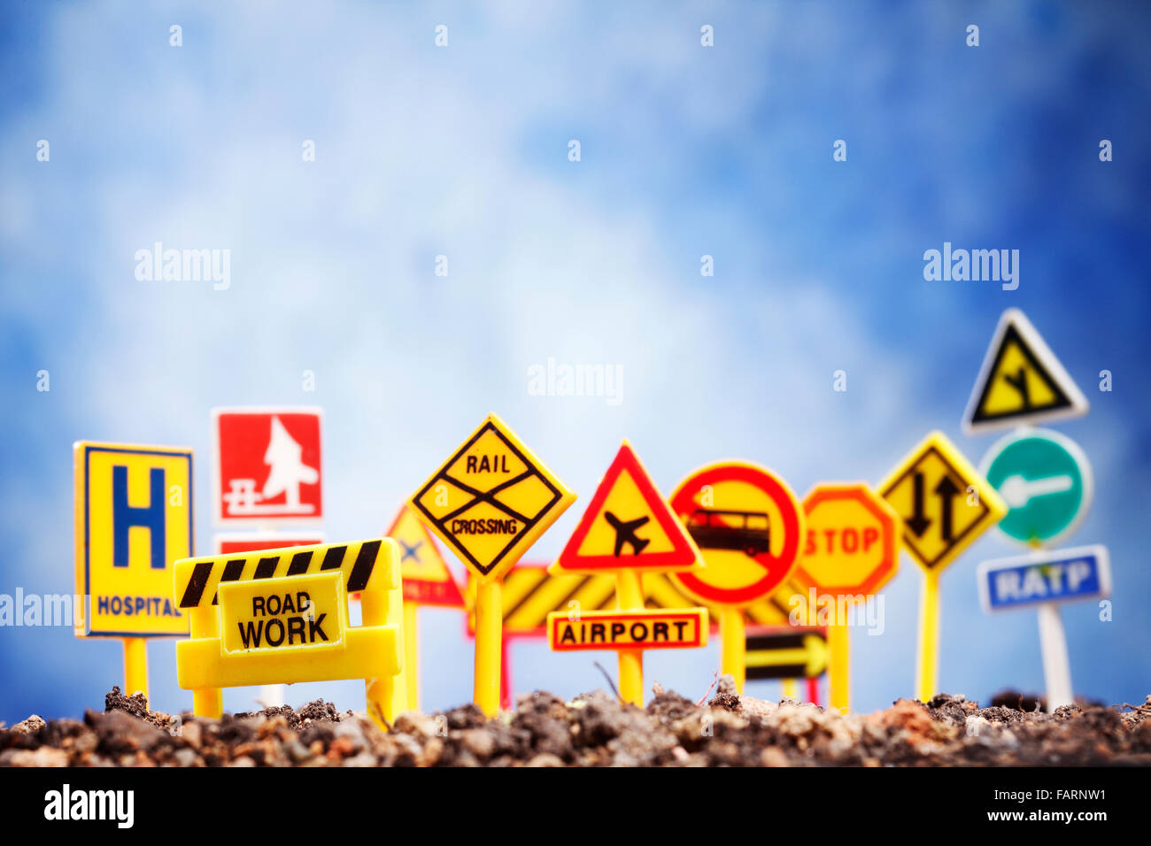 A bunch of signs stuck in gravel Stock Photo - Alamy