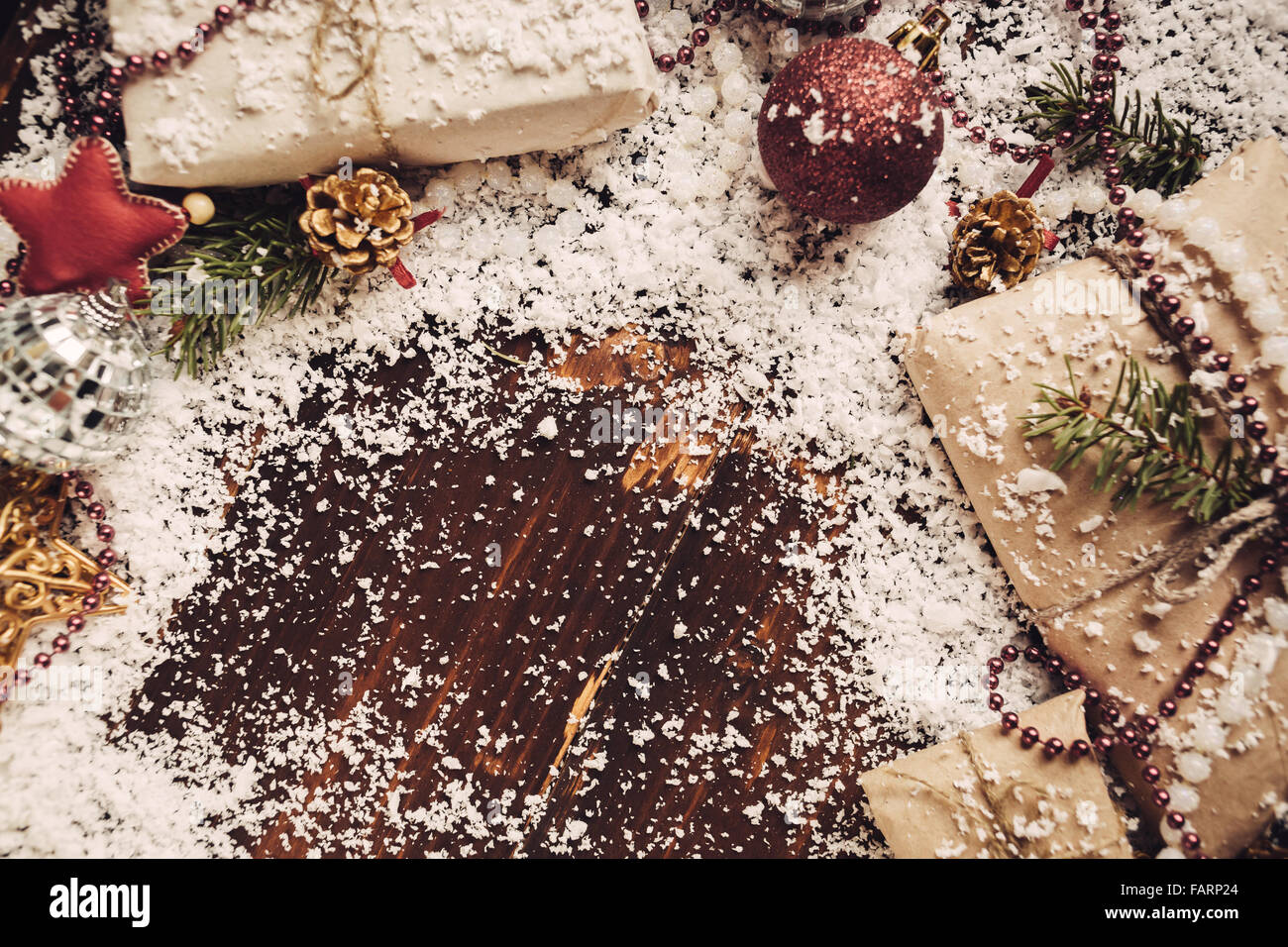 Christmas background with present on snow Stock Photo - Alamy