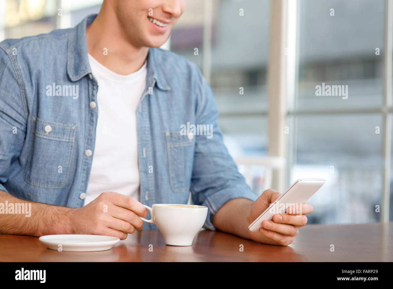 Handsome man sitting in the cafe Stock Photo - Alamy