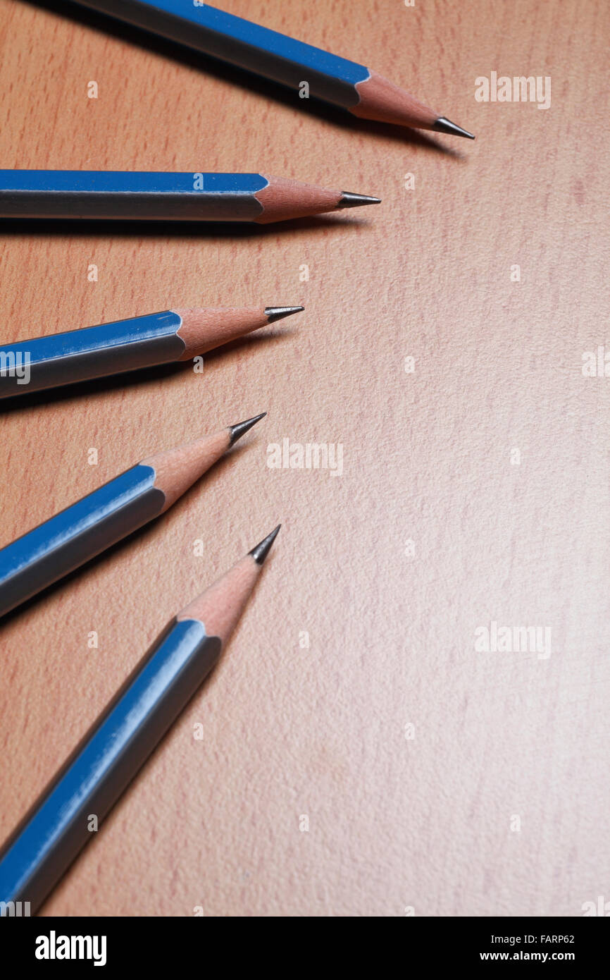 few pencil arranged in a row Stock Photo - Alamy