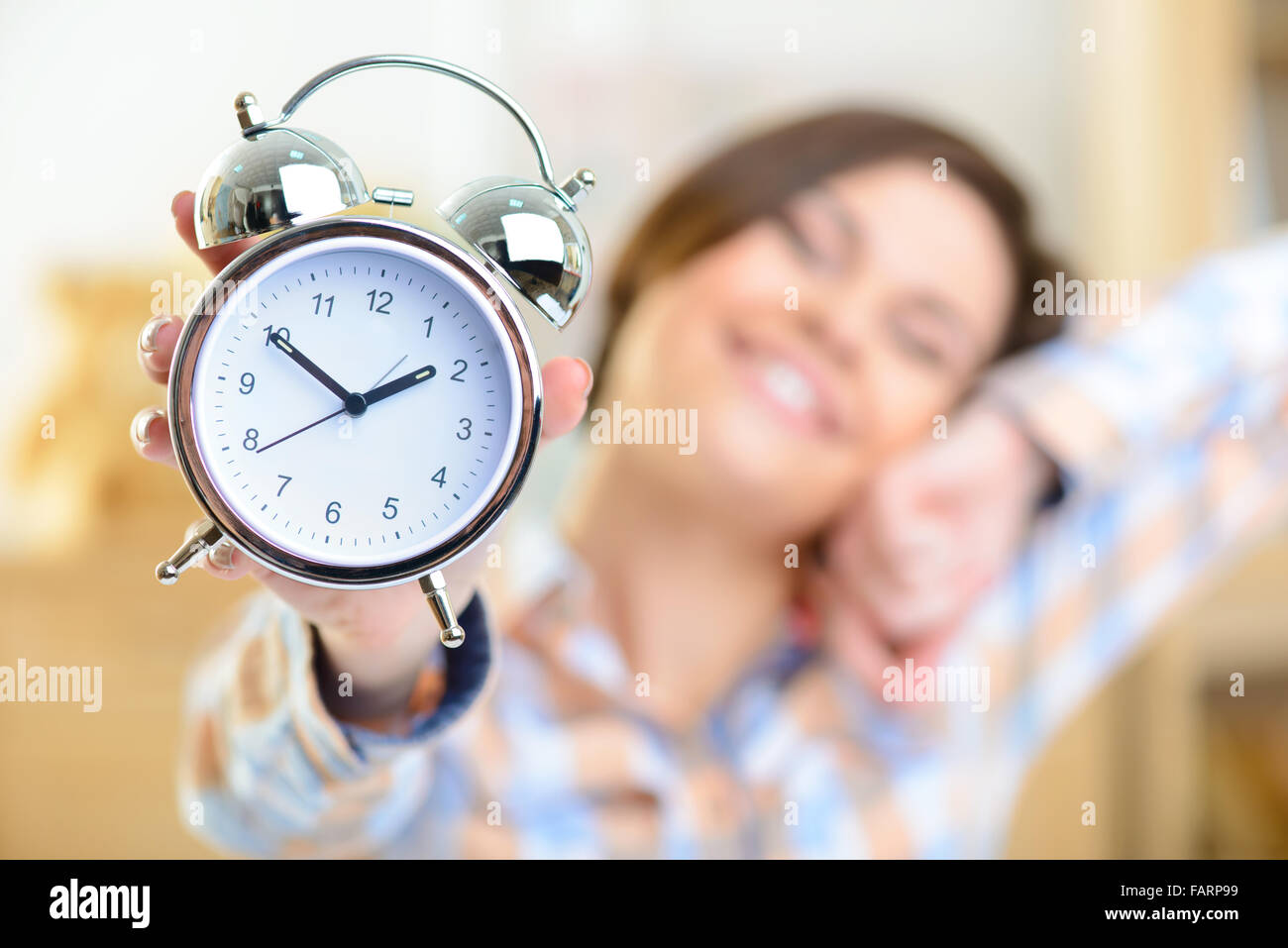 Clock showing an afternoon time Stock Photo - Alamy