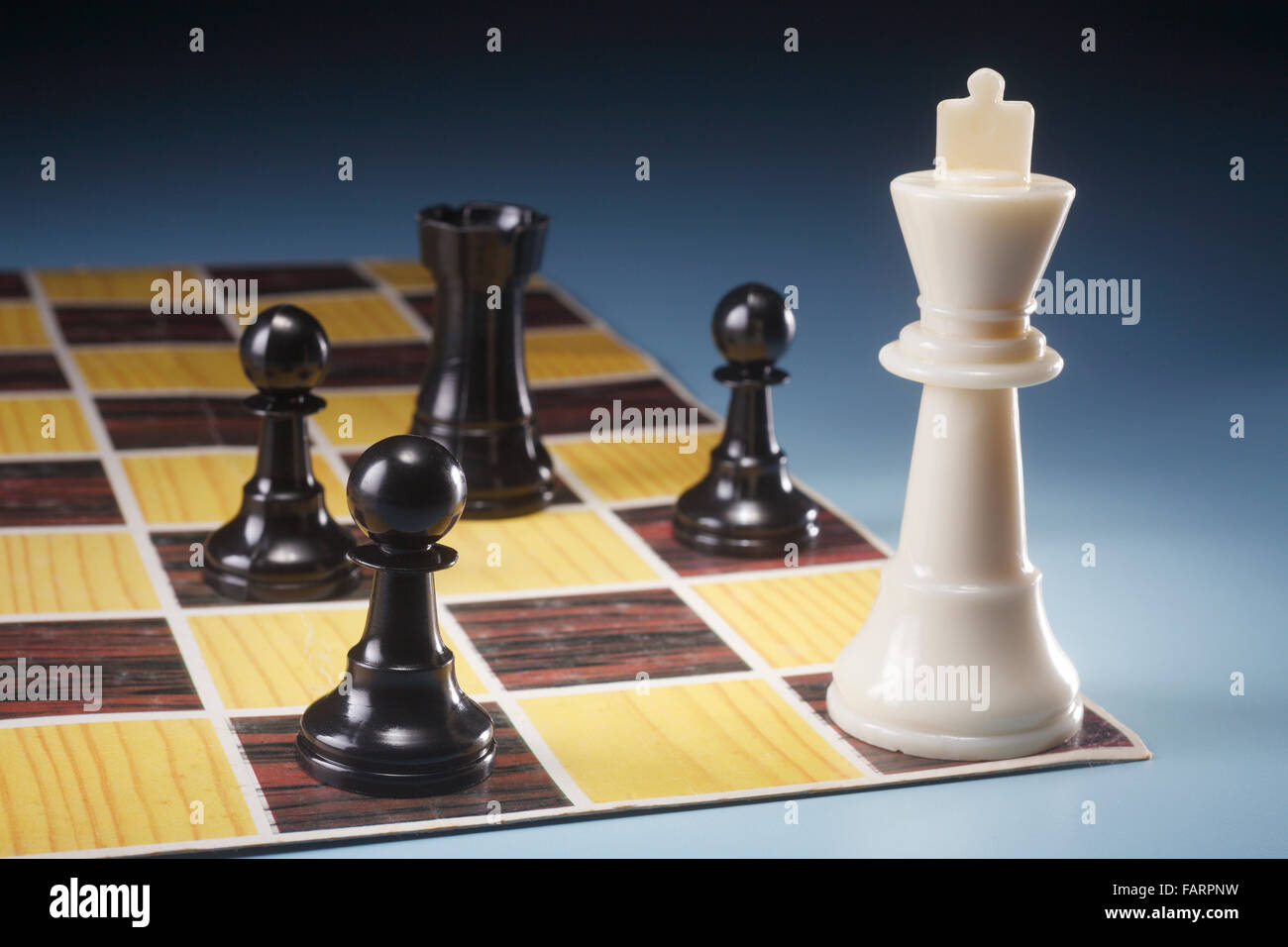 chess pieces on a board showing concept for strategy Stock Photo - Alamy
