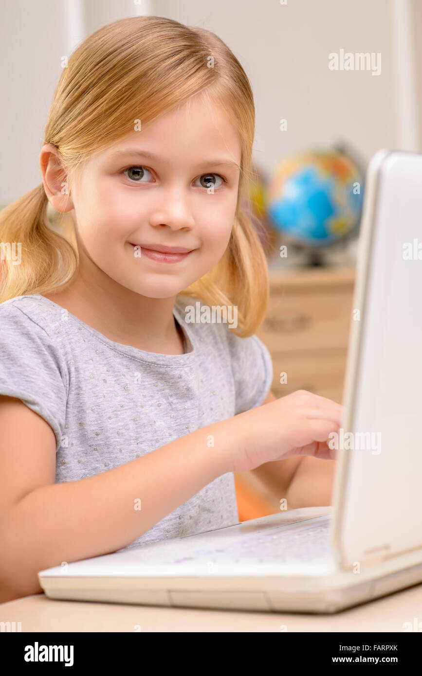 Pretty girls sitting at the table Stock Photo - Alamy