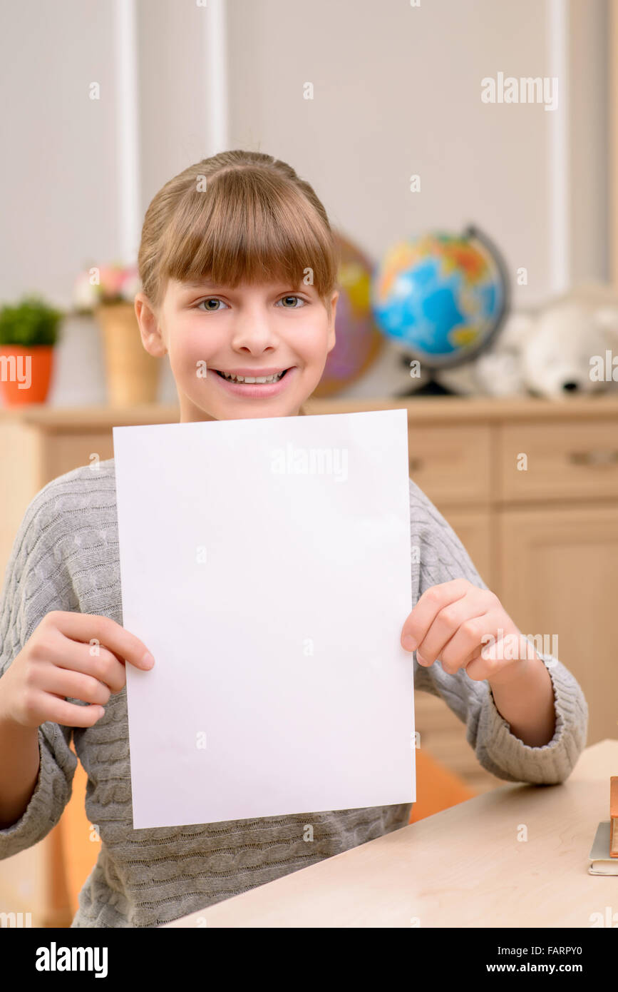 Pretty girls sitting at the table Stock Photo - Alamy