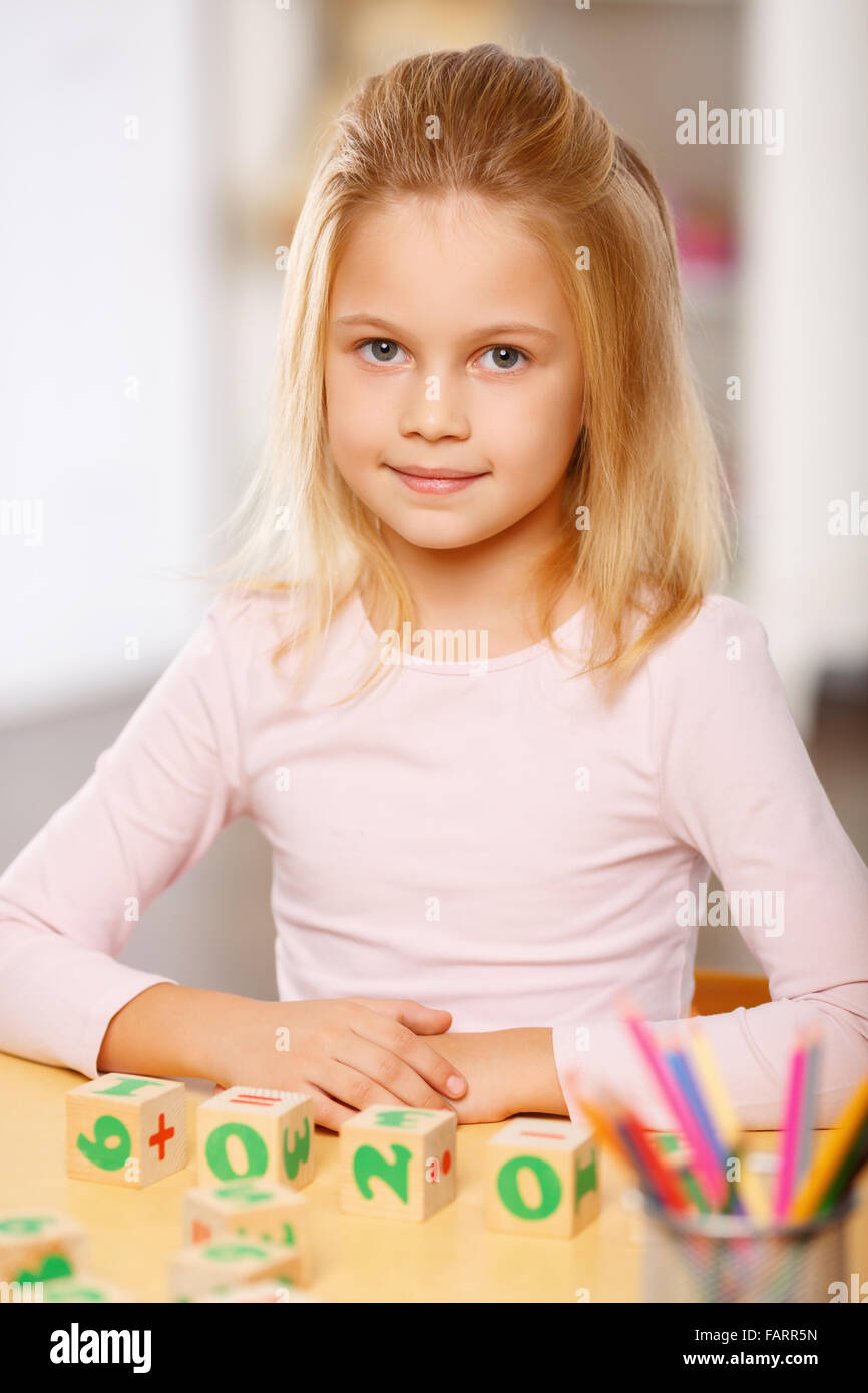 Math activities with unifix cubes Stock Photo - Alamy