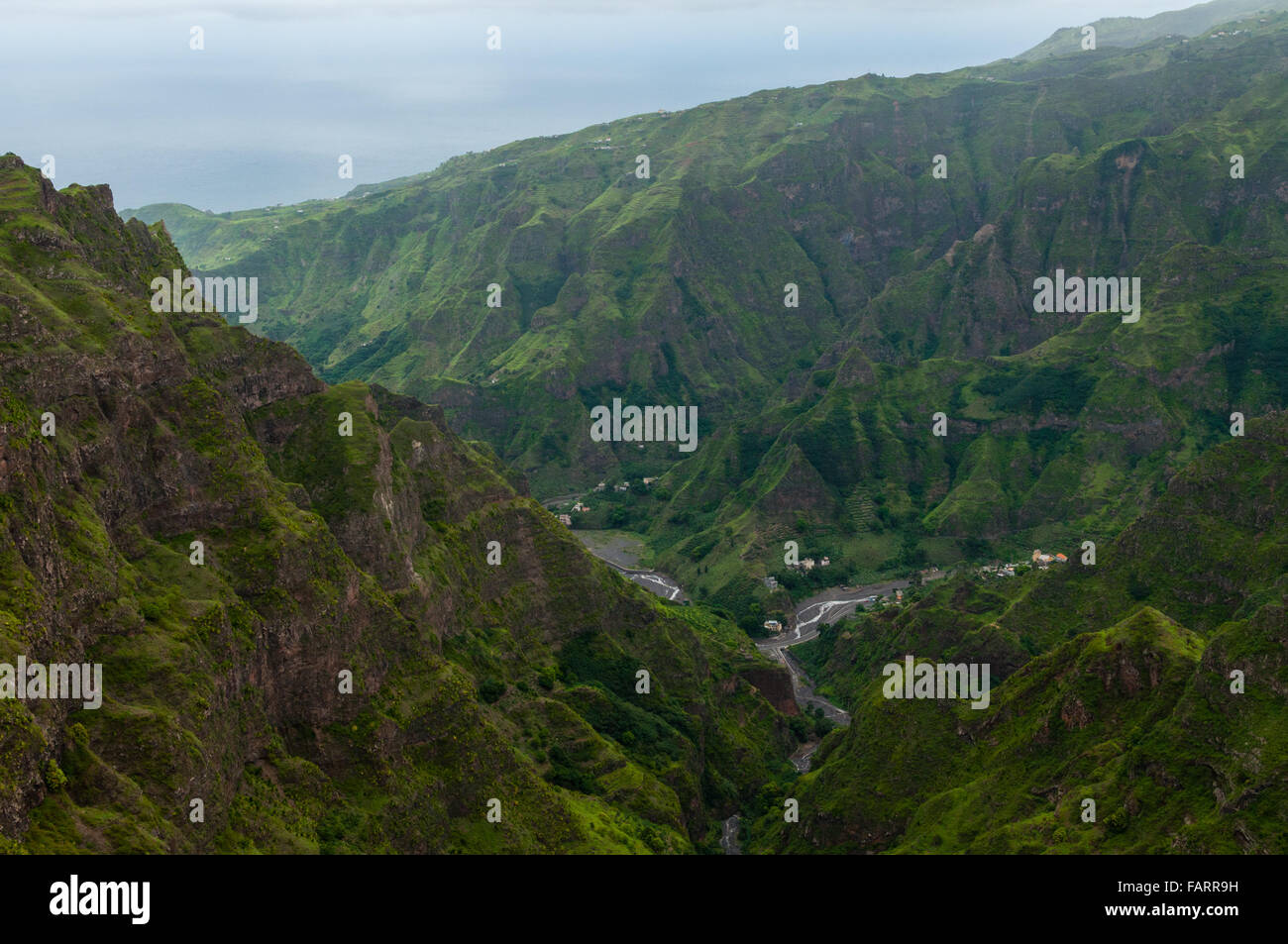 Steep green valley high above in the mountain of cape verde island ...