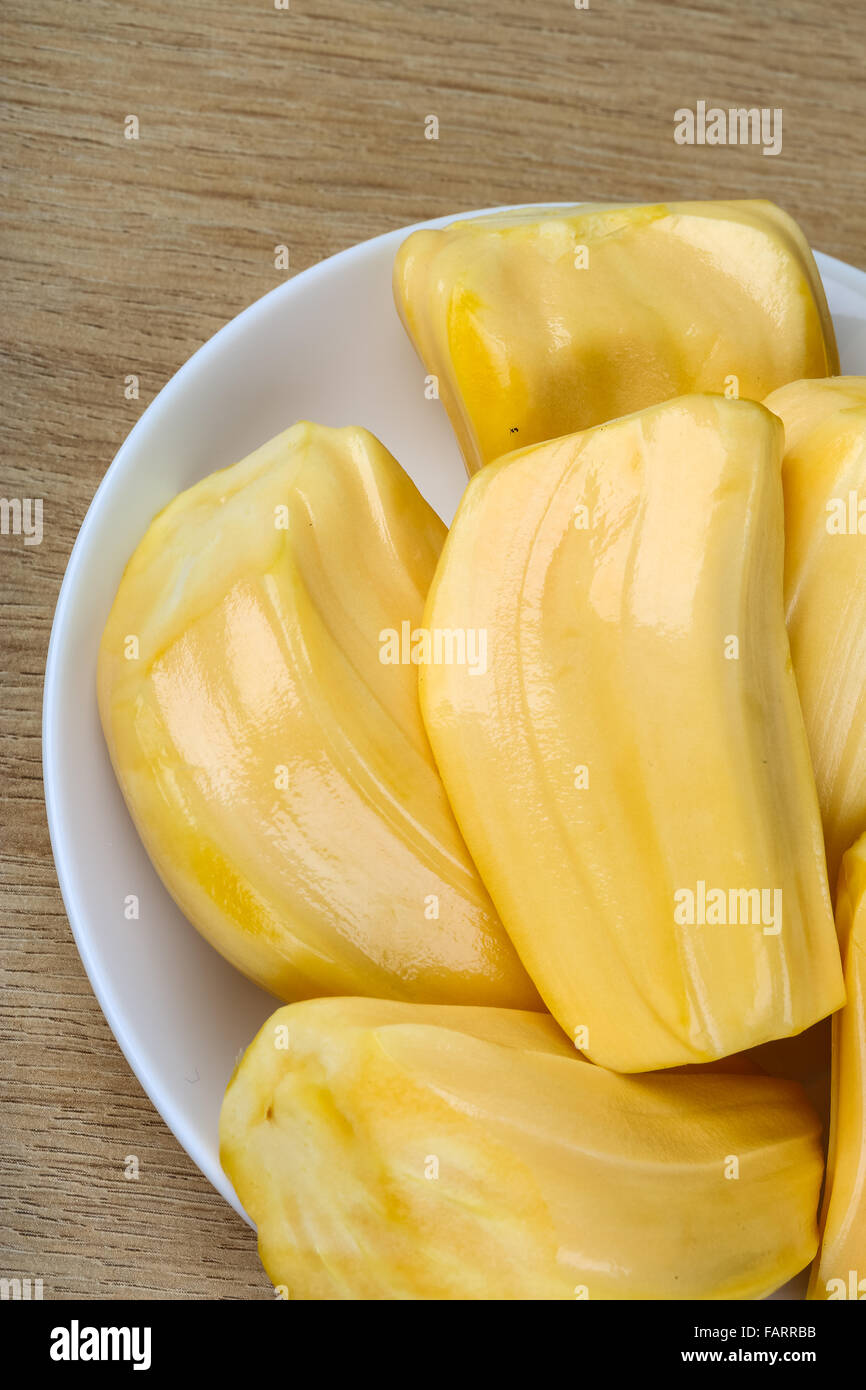 Tropical Jack Fruit on the wood background Stock Photo - Alamy
