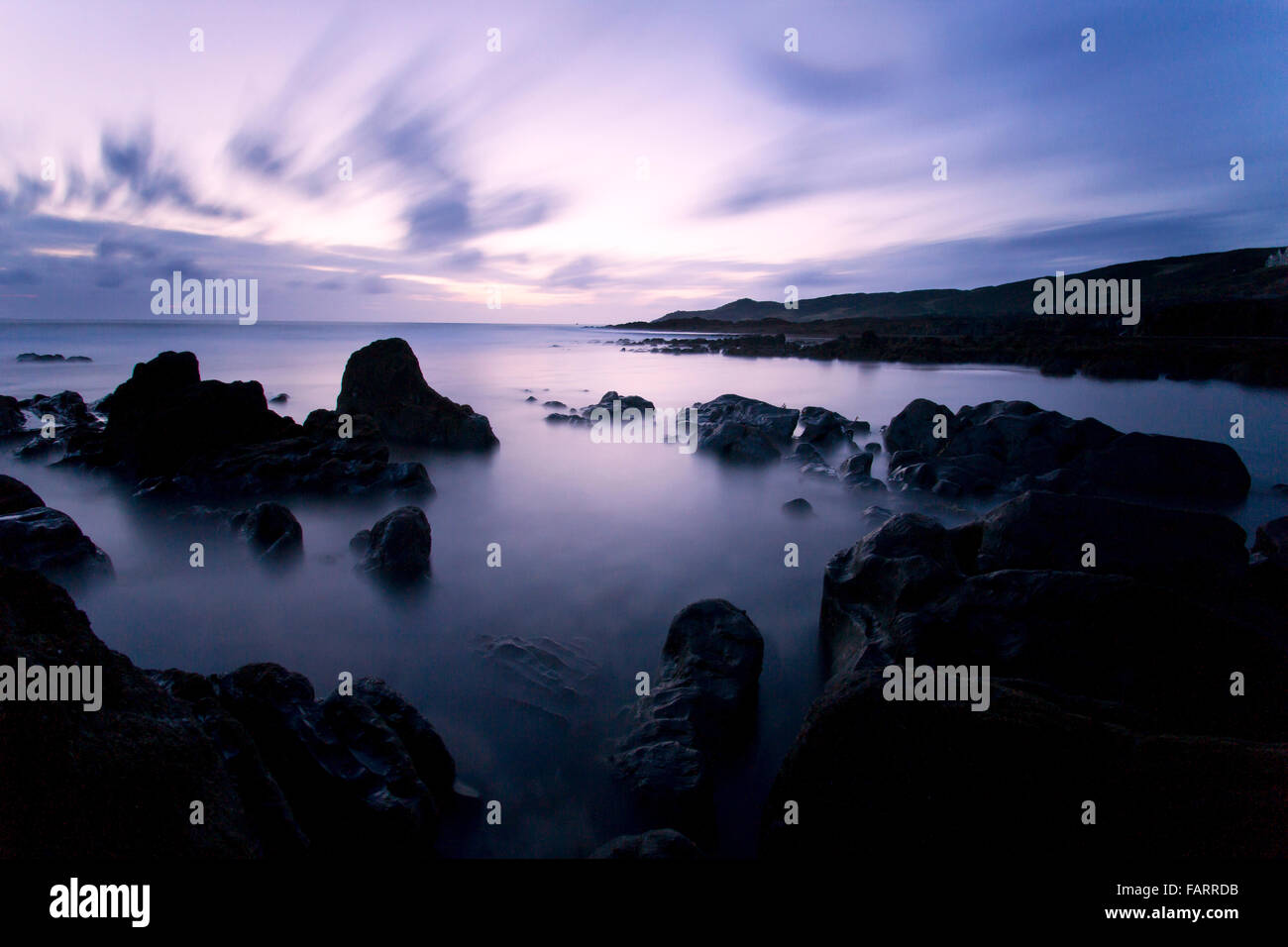 Misty water at sunset in devon Stock Photo - Alamy