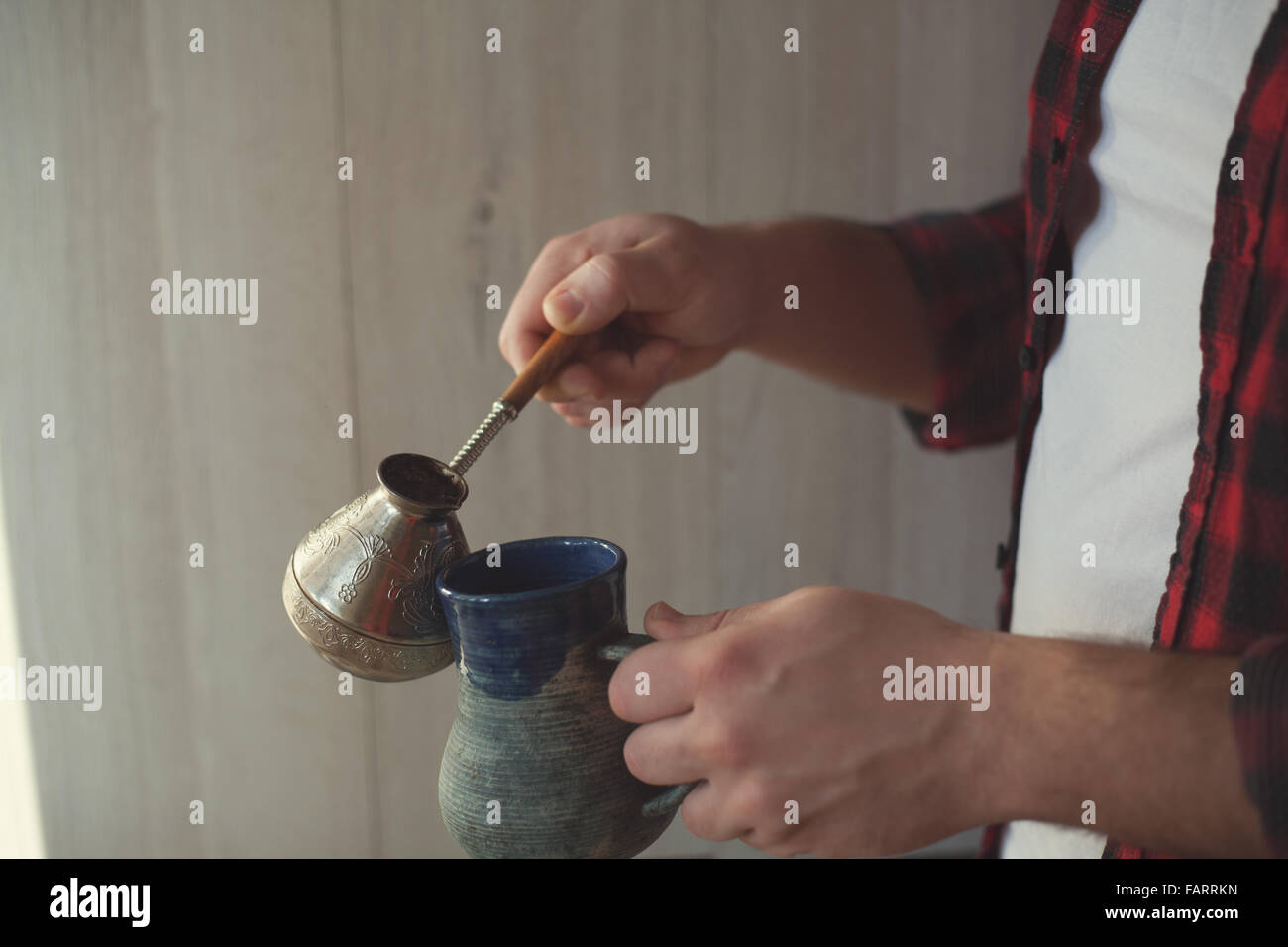 Man making a coffee Stock Photo - Alamy