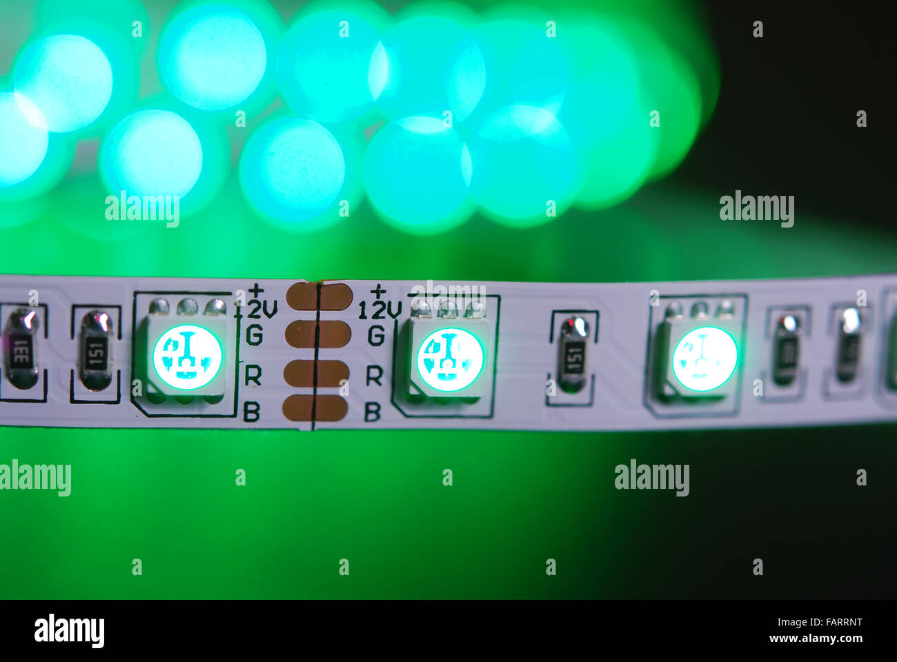 Green led strip on the black background Stock Photo - Alamy