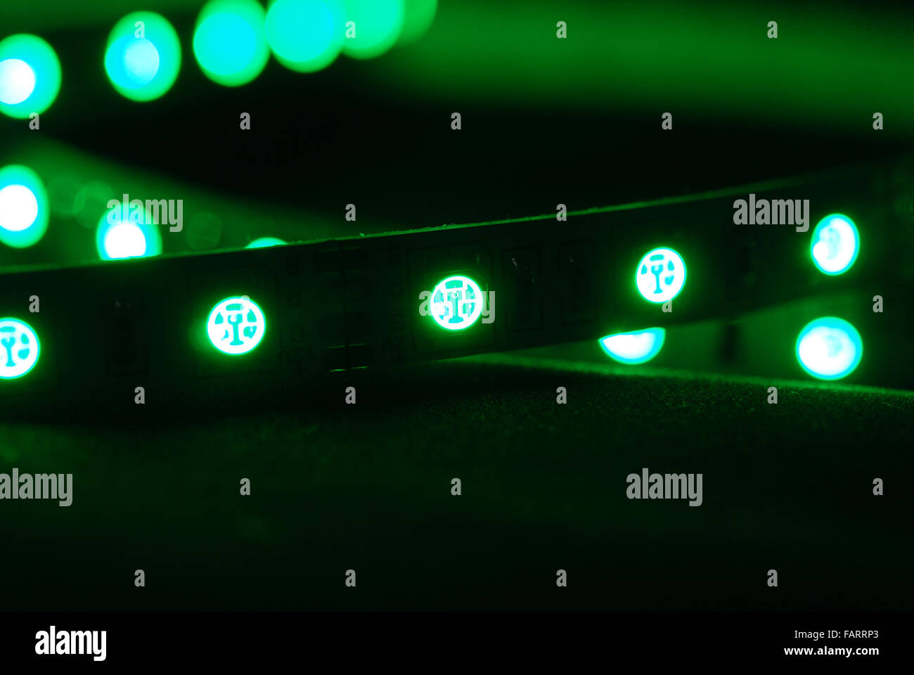 Green led strip on the background of textile Stock Photo - Alamy