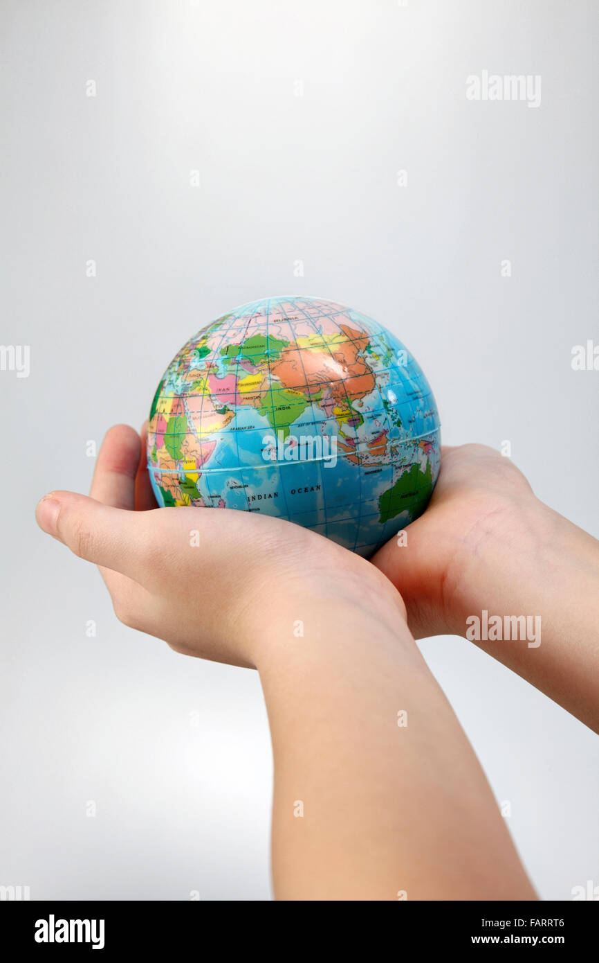 Globe green hands hi-res stock photography and images - Alamy