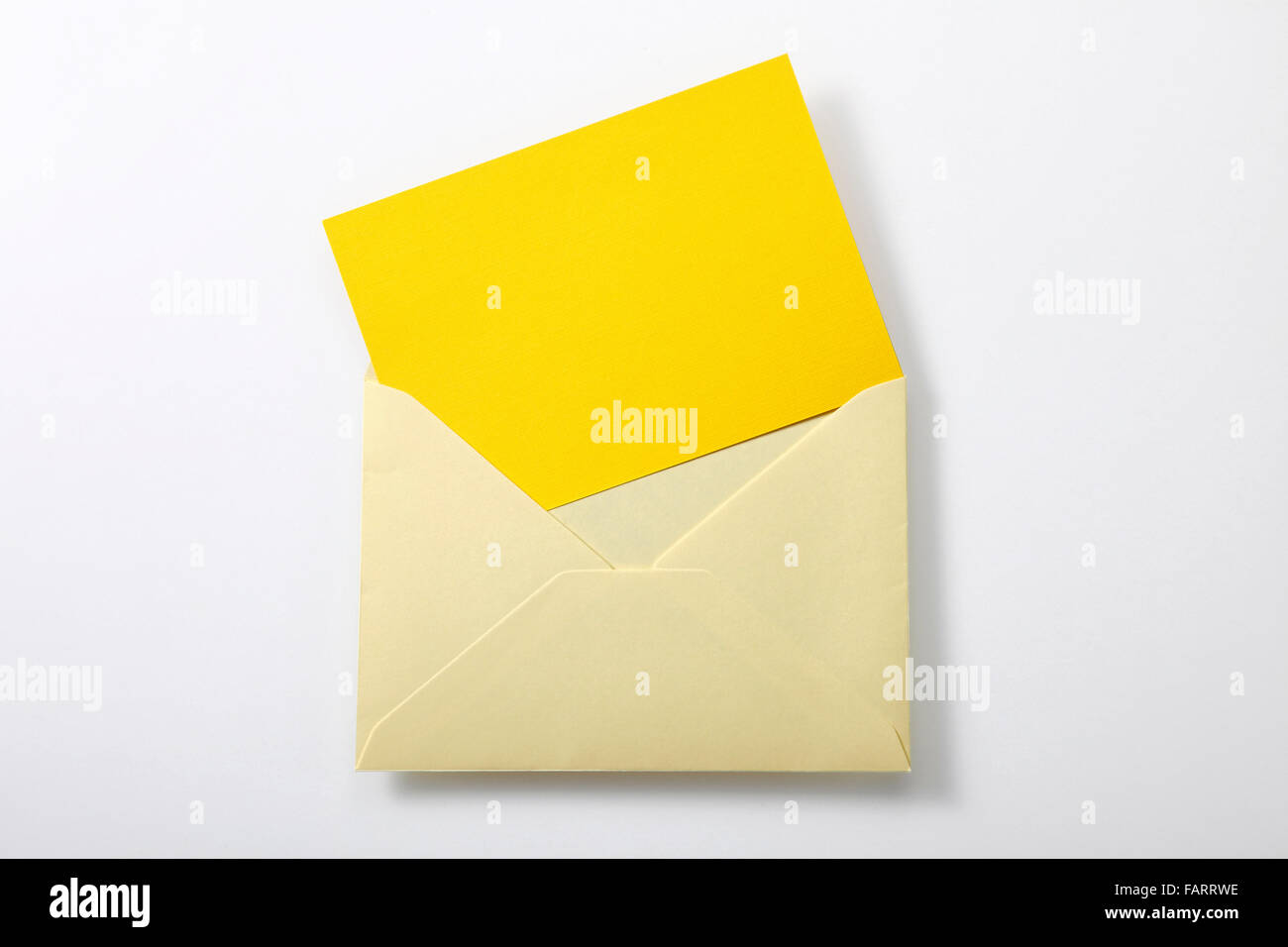 envelope with blank paper isolate in plain background Stock Photo - Alamy