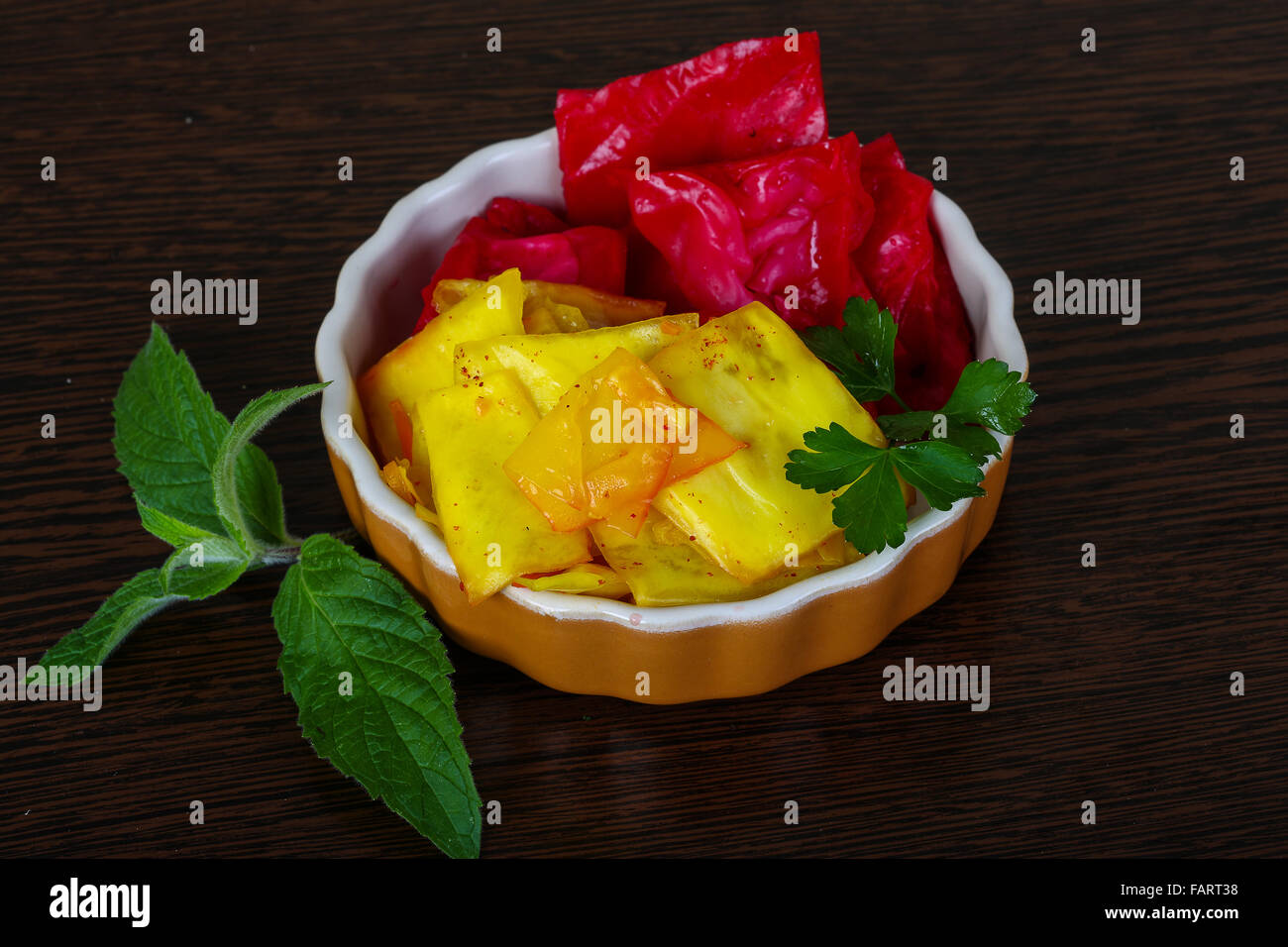 Red and yellow Pickled cabbage with parsley and marinated tomato Stock ...