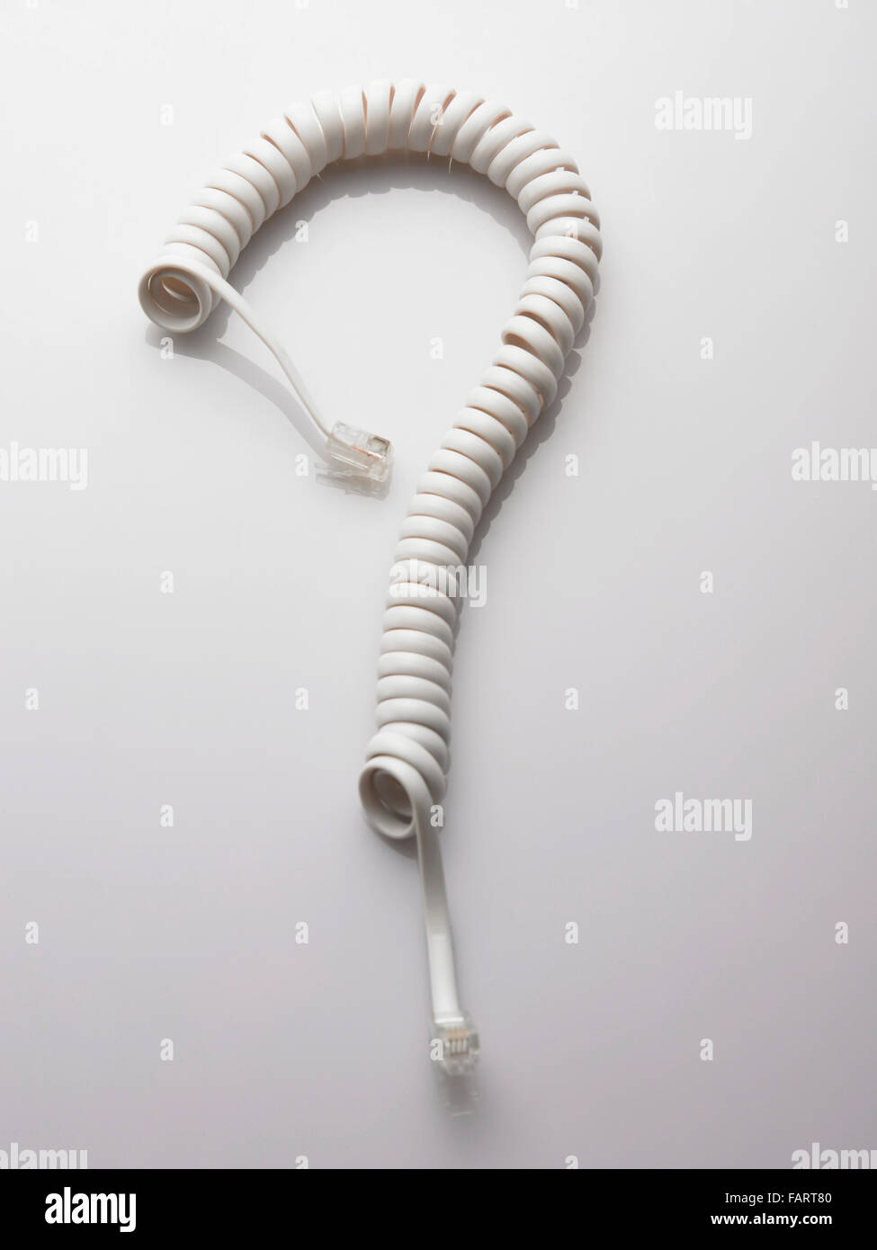 telephone cord form a curve-question mark Stock Photo - Alamy