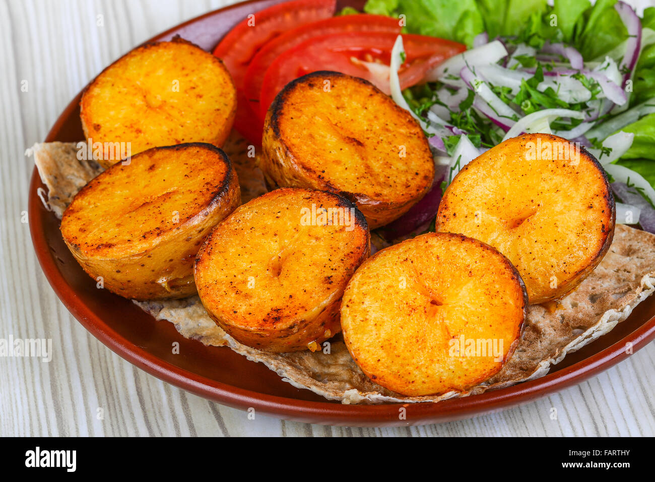 Baked potato - vegetarian barbeque - shashlik served onion rings and ...