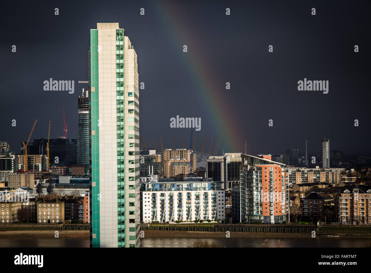 London, UK. 4th January, 2016. UK Weather: Rainbow breaks over London ...