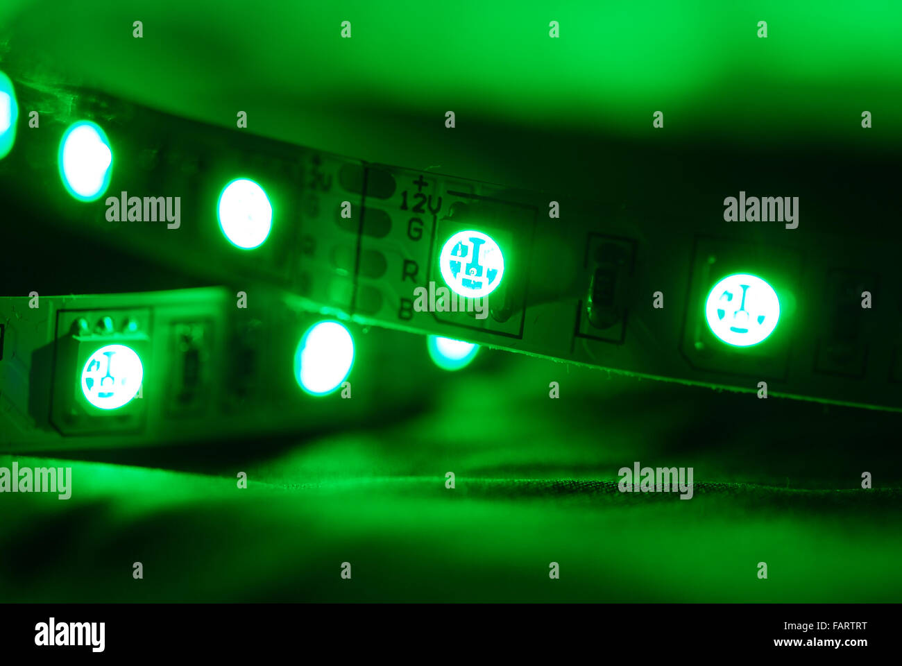 Green led strip on the background of textile Stock Photo - Alamy