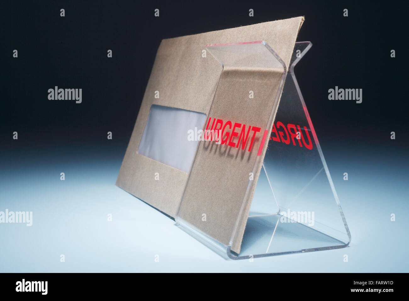 An envelope inserted in a sign Stock Photo - Alamy