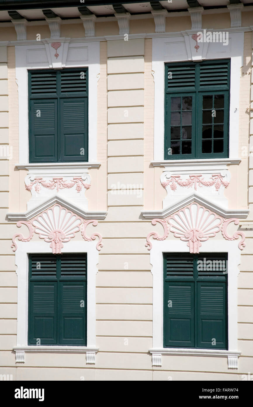 Four window frames on a brick wall building Stock Photo - Alamy