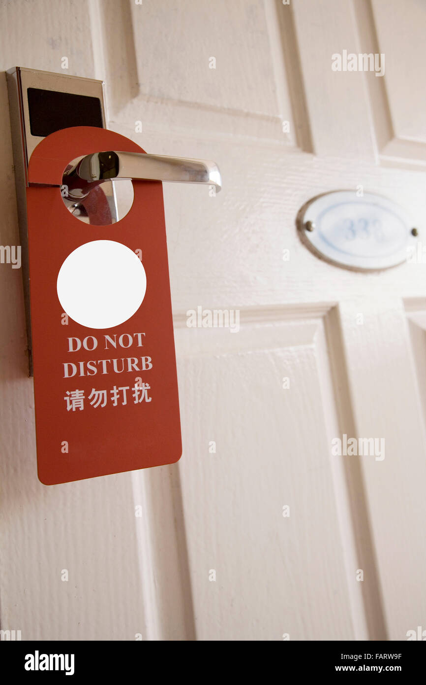 sign on the door handle do not disturb Stock Photo - Alamy