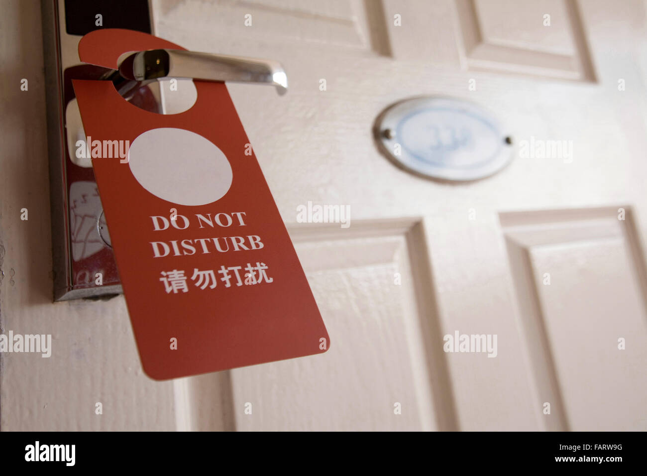 sign on the door handle do not disturb Stock Photo - Alamy