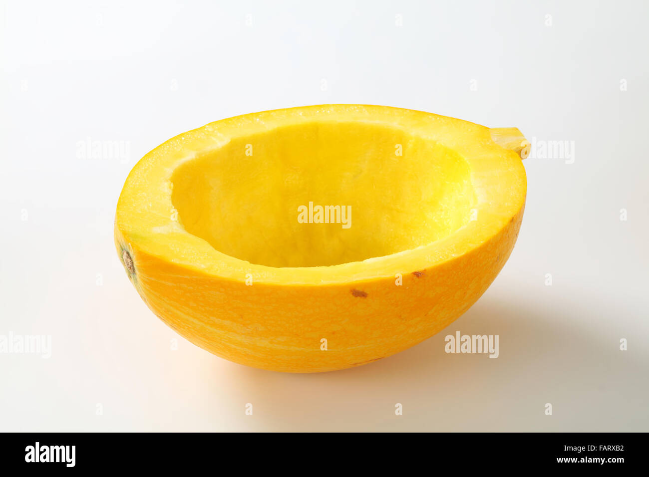 Pumpkin half scraped clean of seeds Stock Photo - Alamy