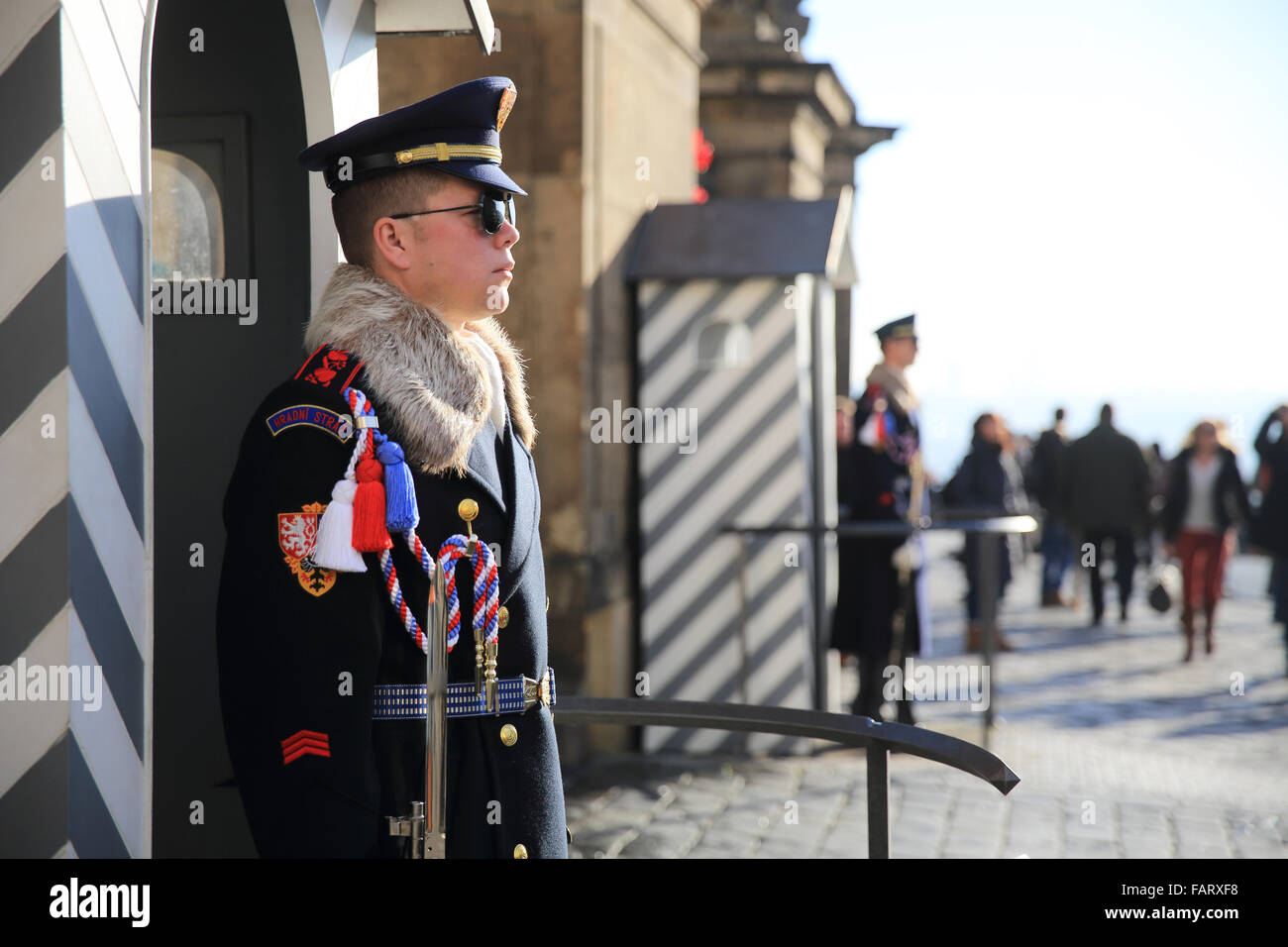 A Castle Guard stands in his sentry box outside the castle in Prague ...
