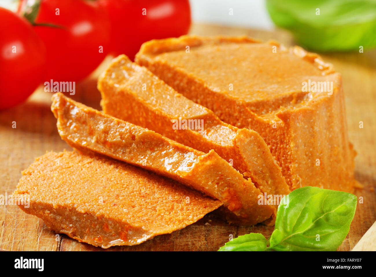 Roasted vegetable chickpea pate on cutting board Stock Photo - Alamy